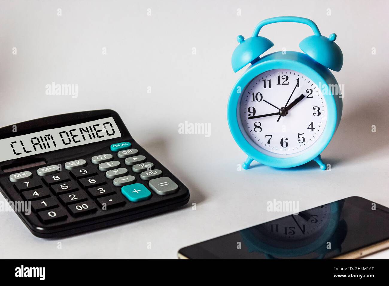 Word CLAIM DENIED On Calculator Business And Tax Concept Stock Photo word-claim-denied-on-calculator-business-and-tax-concept-stock-photo