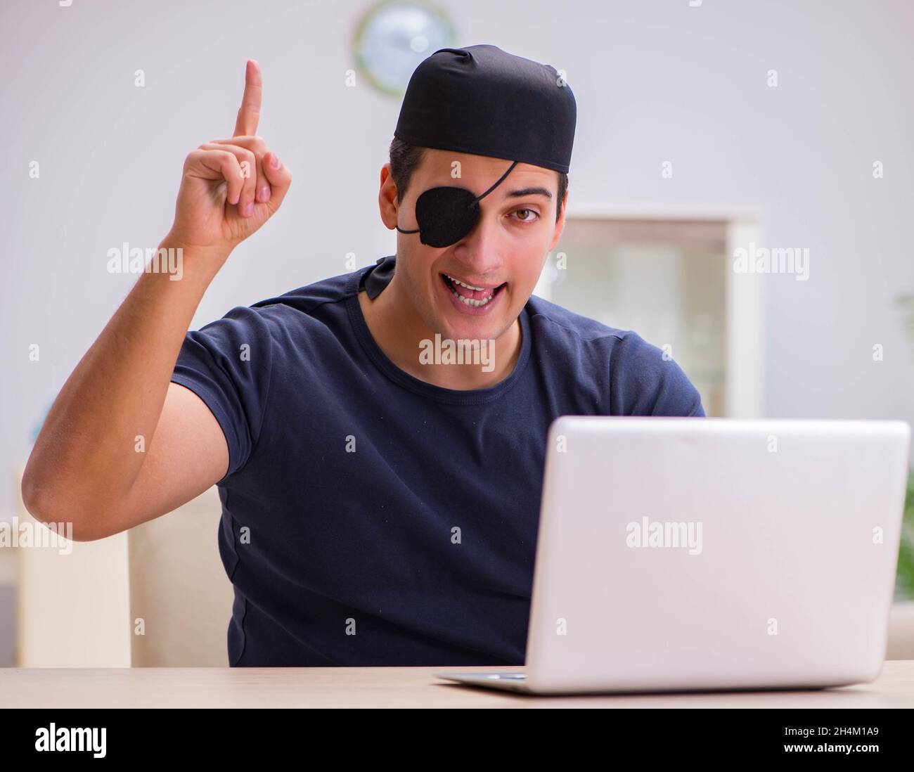 The digital security concept with pirate at computer Stock Photo - Alamy