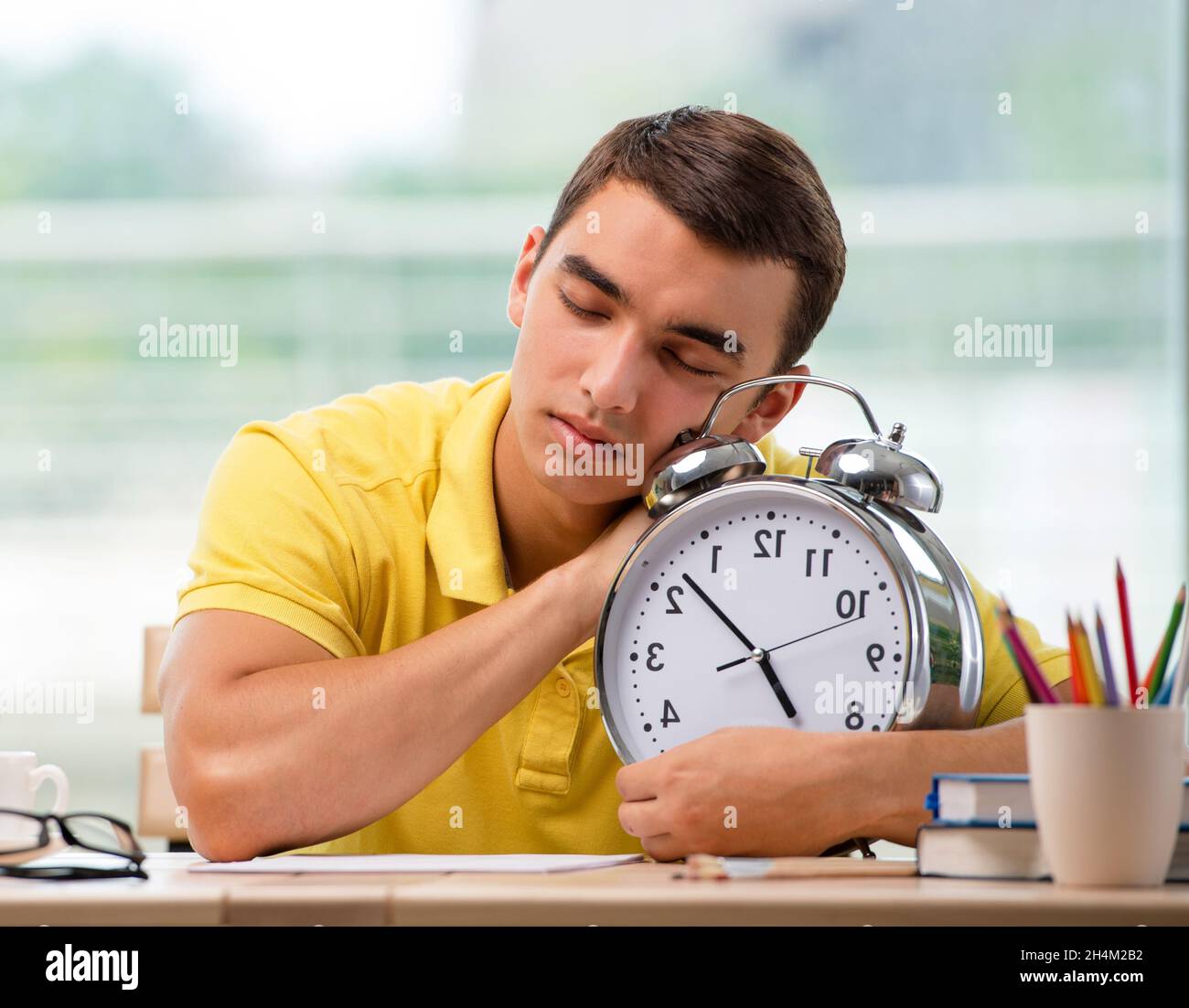 The student missing deadlines for exam preparation Stock Photo - Alamy