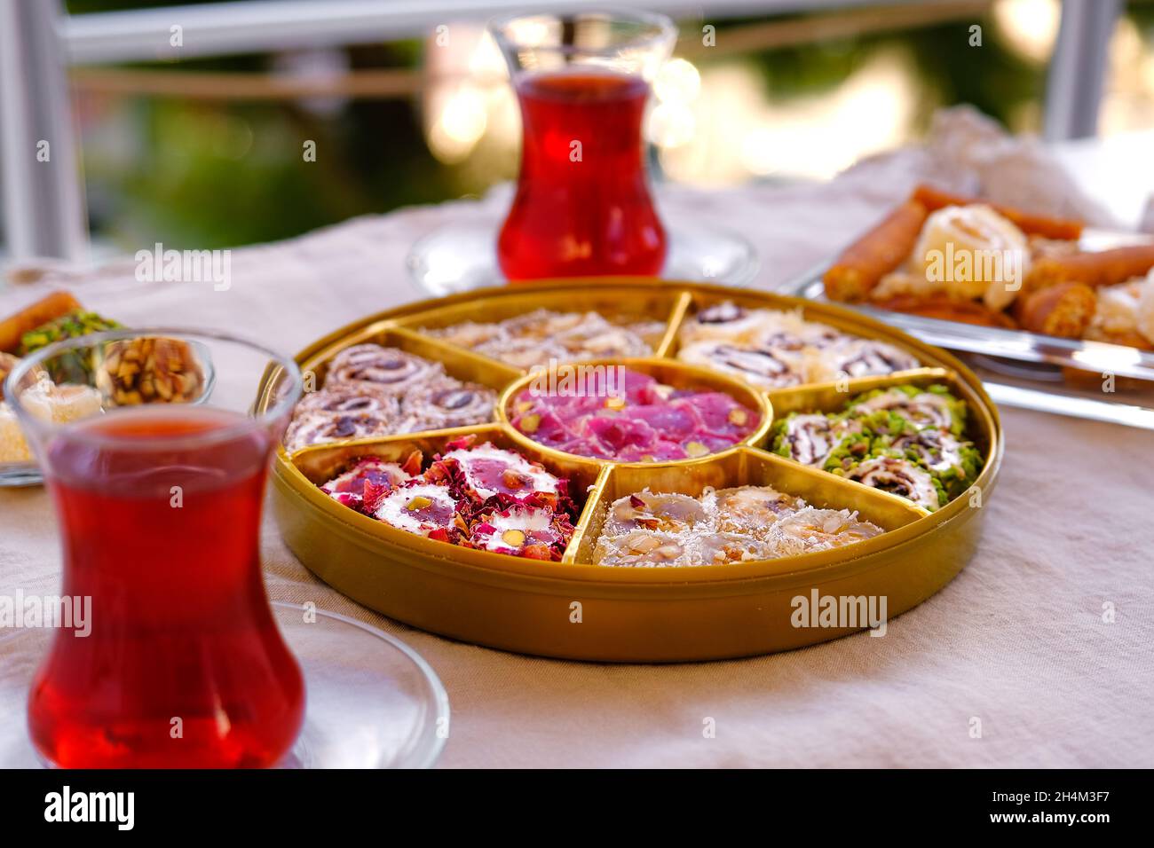 Traditional tea with locum - Turkish delight Stock Photo - Alamy