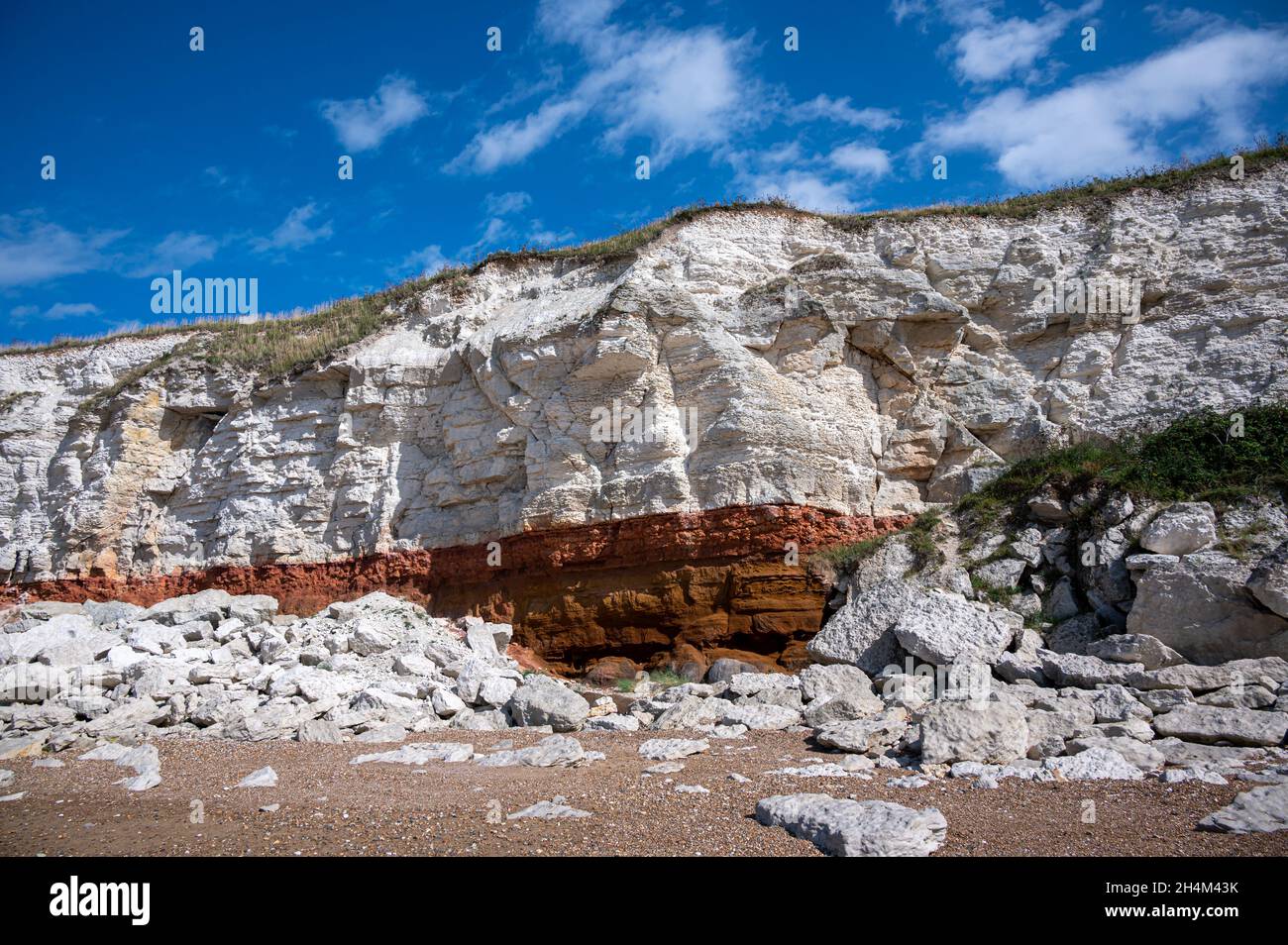 Red and white striped cliffs at Hunstanton, Norfolk, caused by layers ...