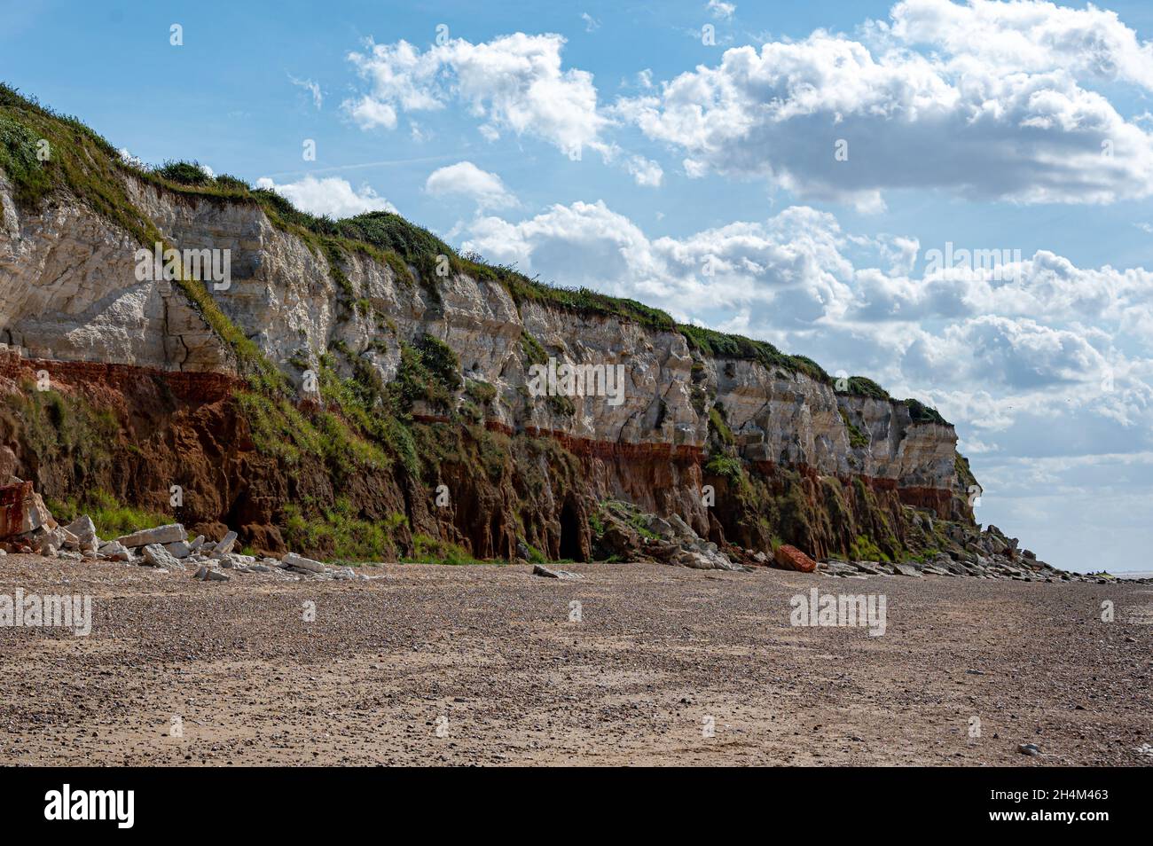 Red and white striped cliffs at Hunstanton, Norfolk, caused by layers ...