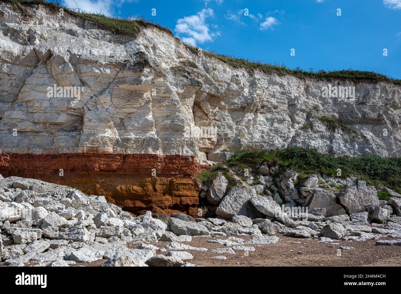 Red and white striped cliffs at Hunstanton, Norfolk, caused by layers ...