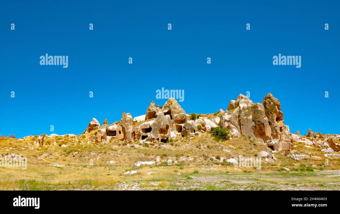 Fairy Chimneys around the Goreme town in Cappadocia Turkey. Peri ...