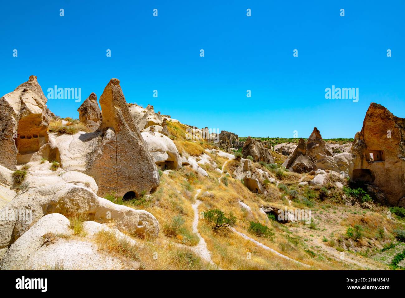 Fairy Chimneys around the Goreme town in Cappadocia Turkey. Peri ...