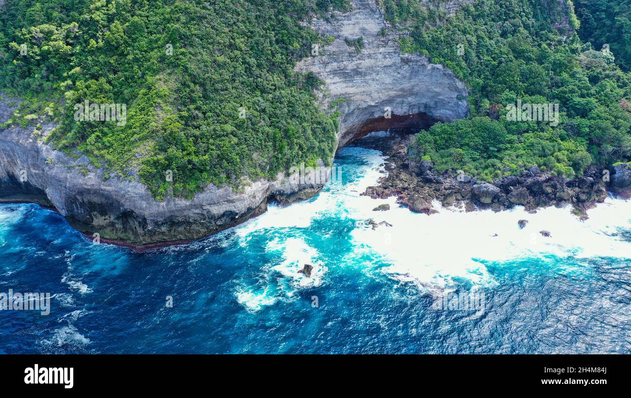 Aerial view of cliffs and the blue sea in Nusa Penida Island Stock ...