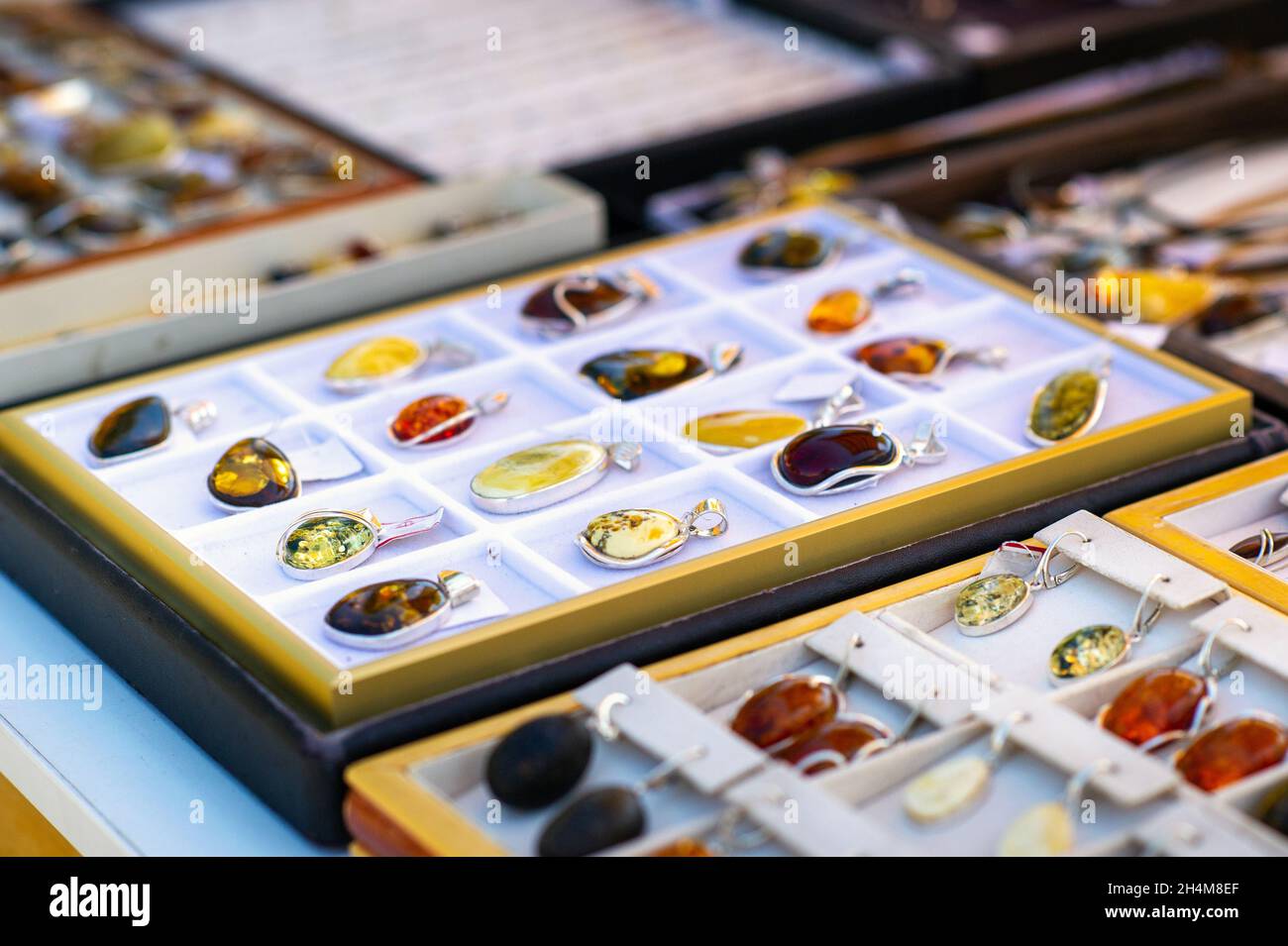 Lithuania. Amber jewelry in various colors for sale on the Lithuanian ...