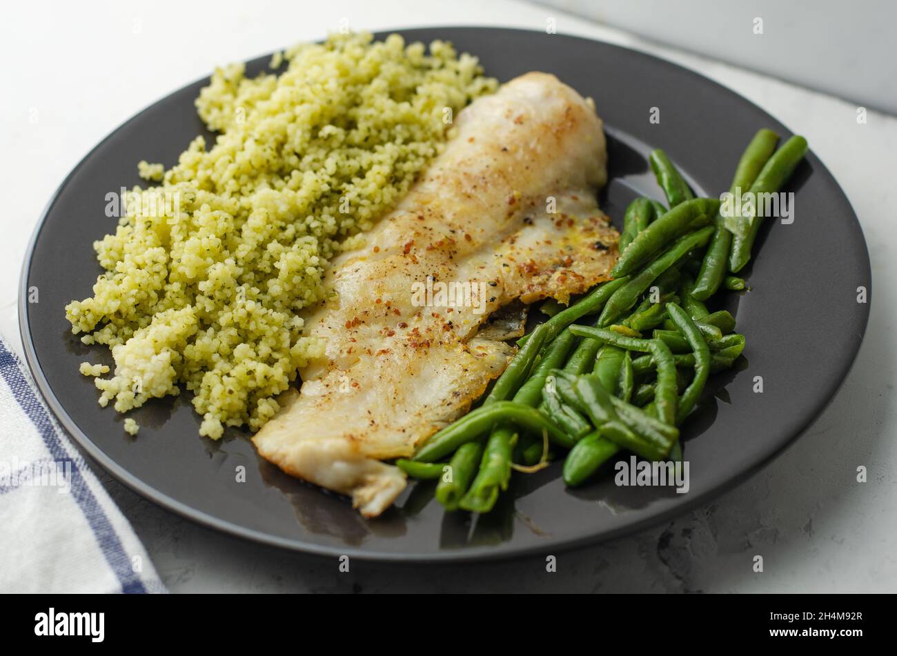 Fish tomato sauce beans hi-res stock photography and images - Alamy