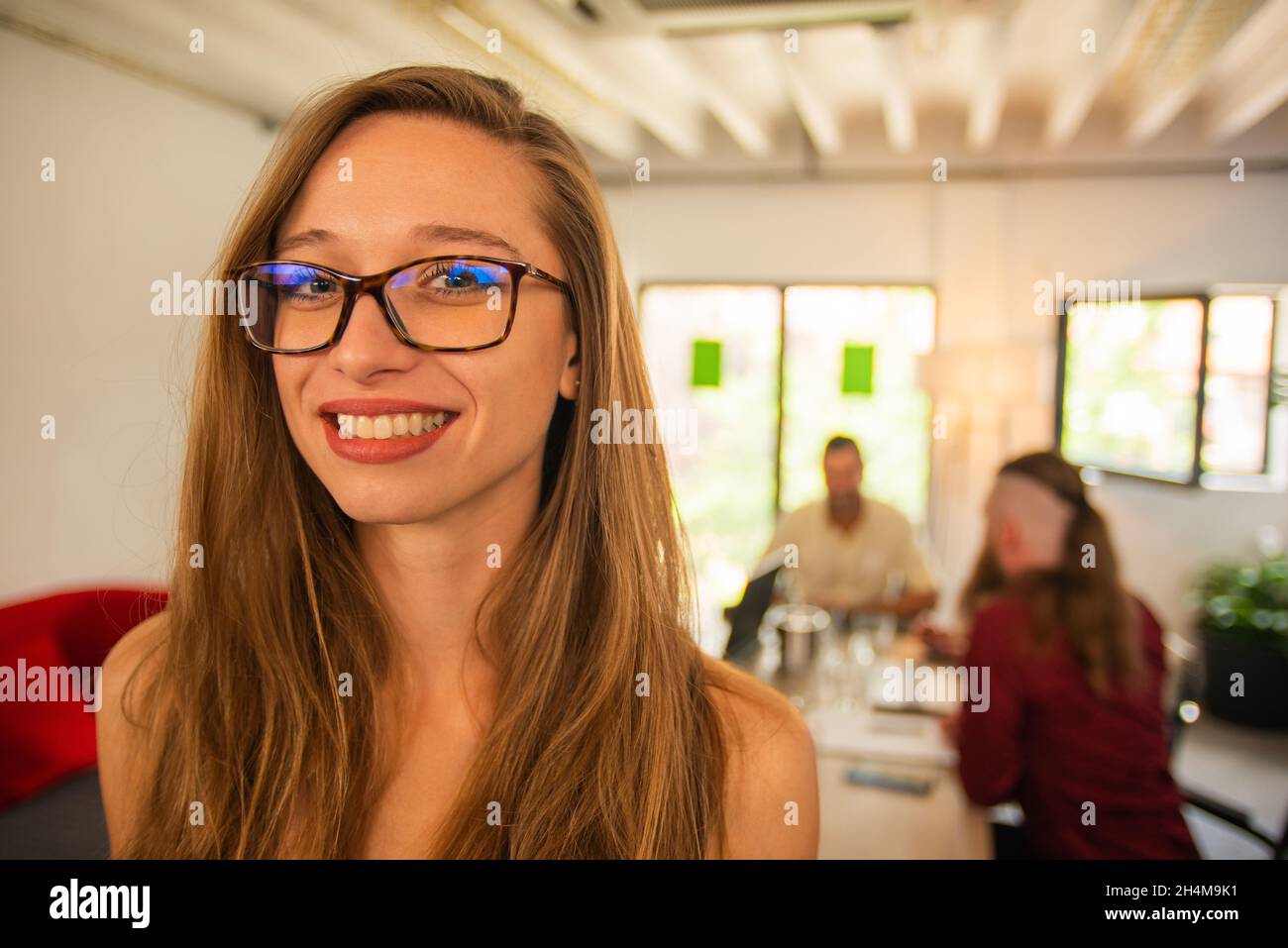 Close up portrait of beautiful female boss smiling Stock Photo - Alamy