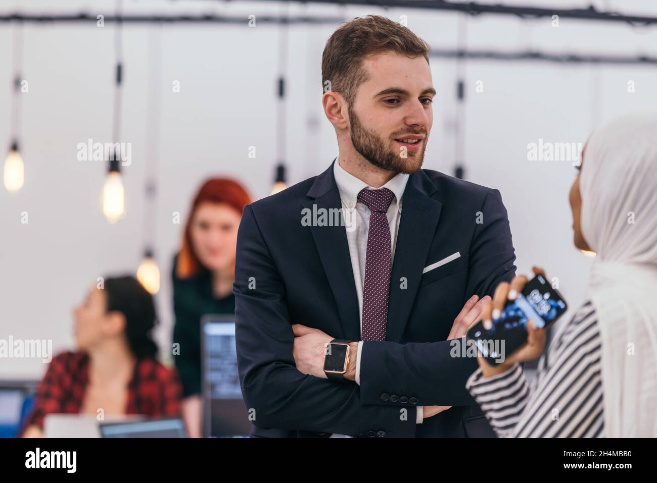 Portrait of a formal businessman and young African American ...