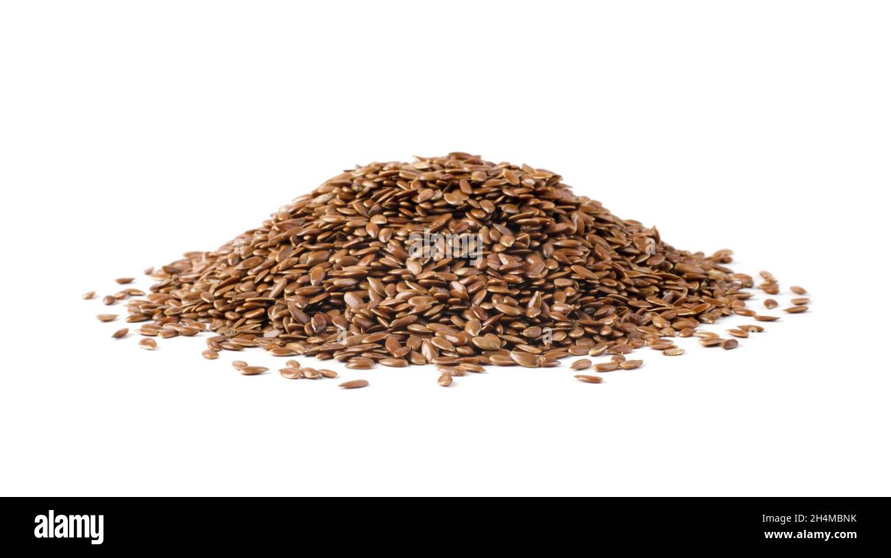 Pile of flax seeds isolated on a white background close-up Stock Photo - Alamy