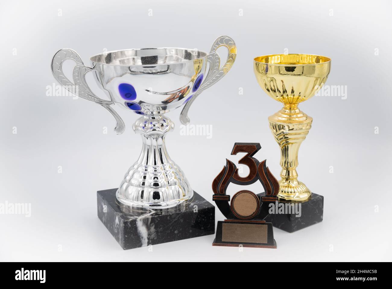 three different kind of trophies. Isolated on white background Stock ...