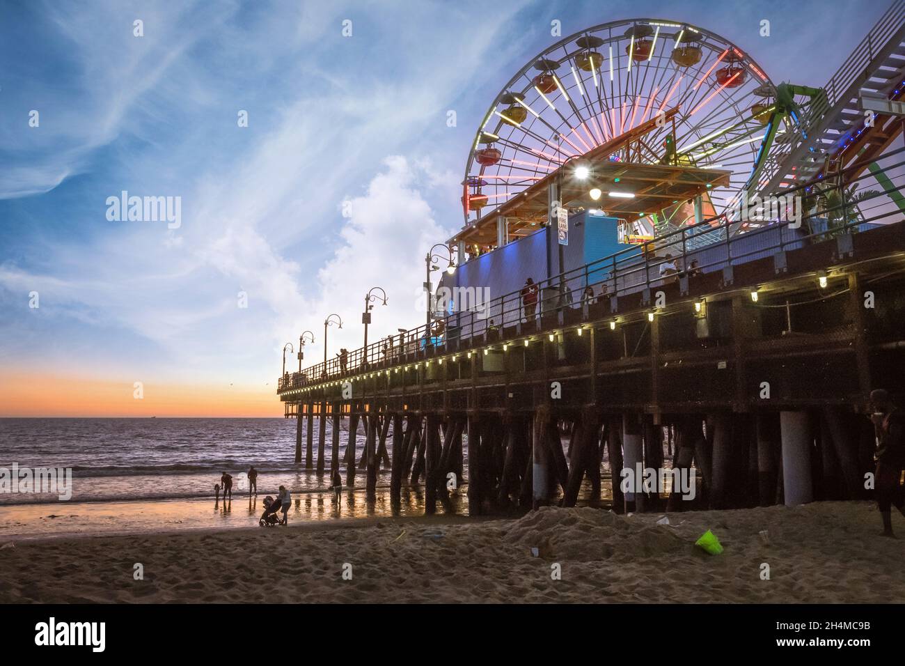 Santa Monica Pier and its amusement park off a coast in California at ...