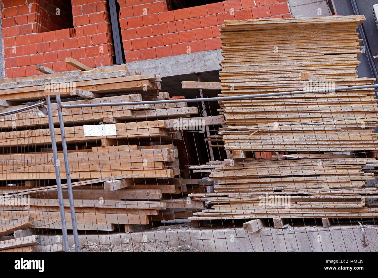 Plank wooden boards stack outside on a construction site Stock Photo ...
