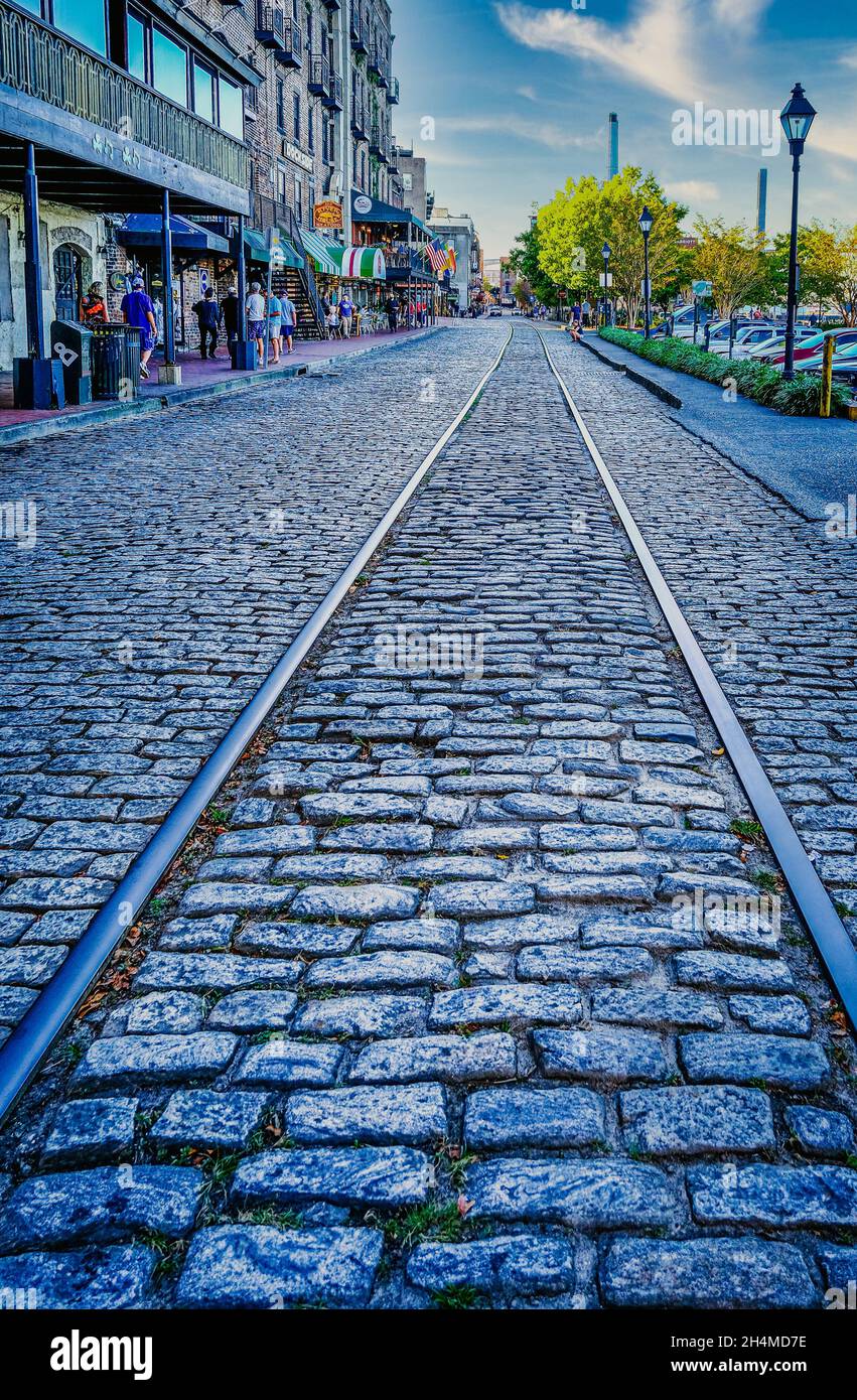 Steel Rails in Cobblestone Street Stock Photo - Alamy