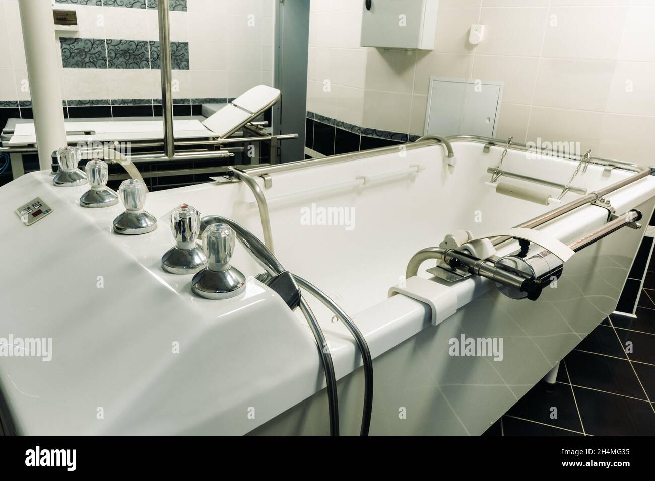 underwater shower bath with massage and stretching on the table in the ...