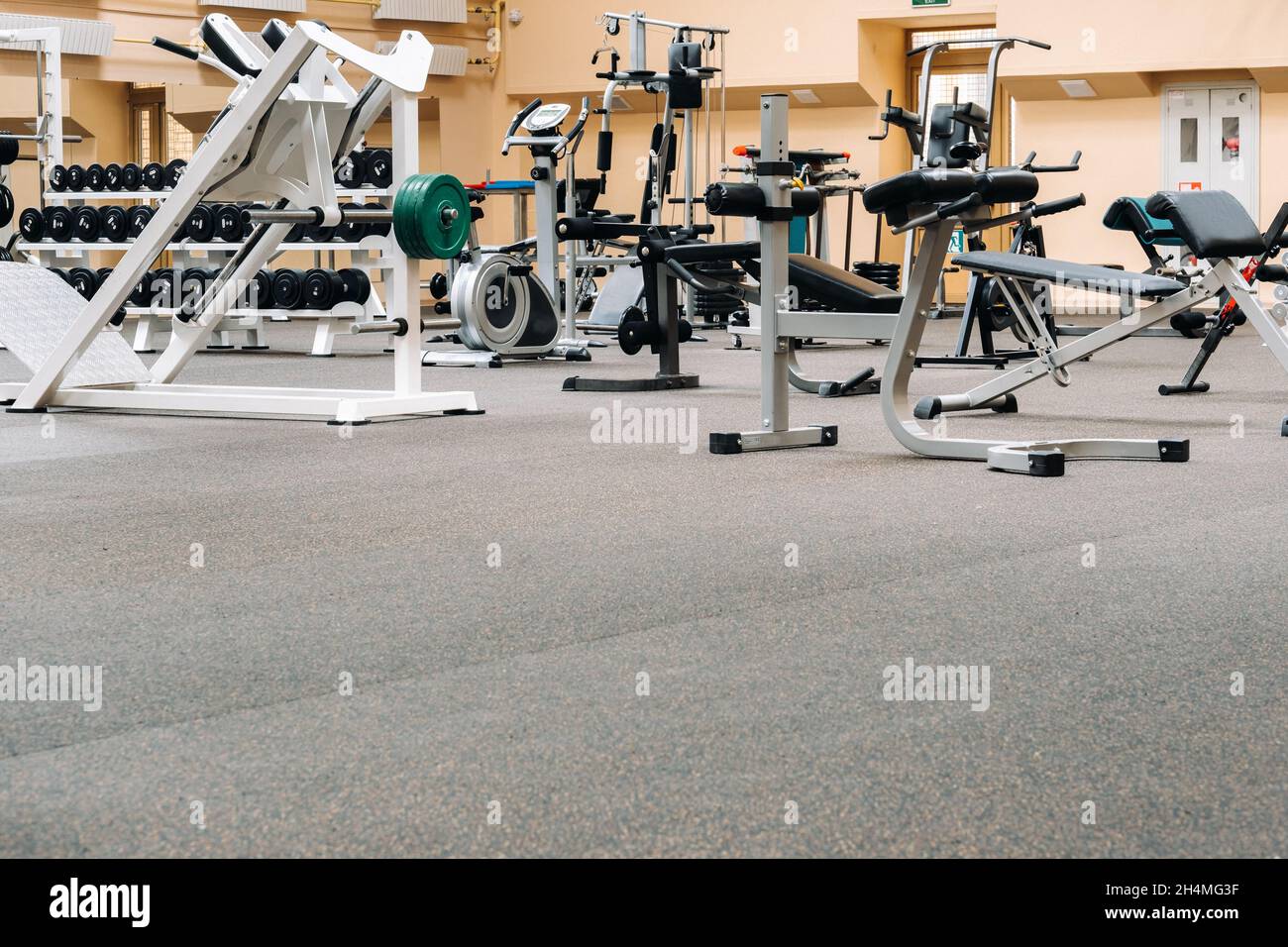 Workout room with different weight lifting equipment dumbbell hi-res ...