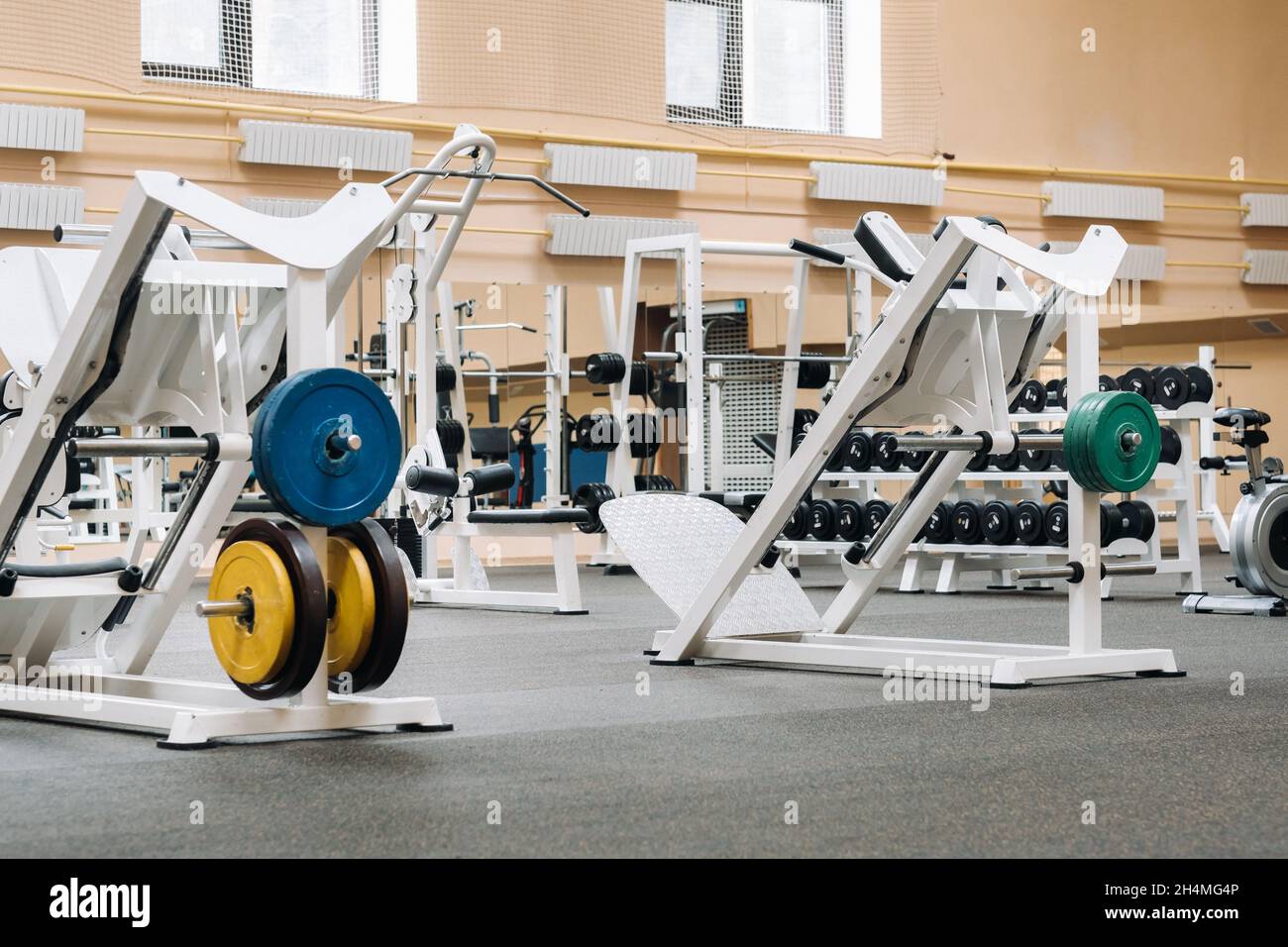 Workout room with different weight lifting equipment dumbbell hi-res ...