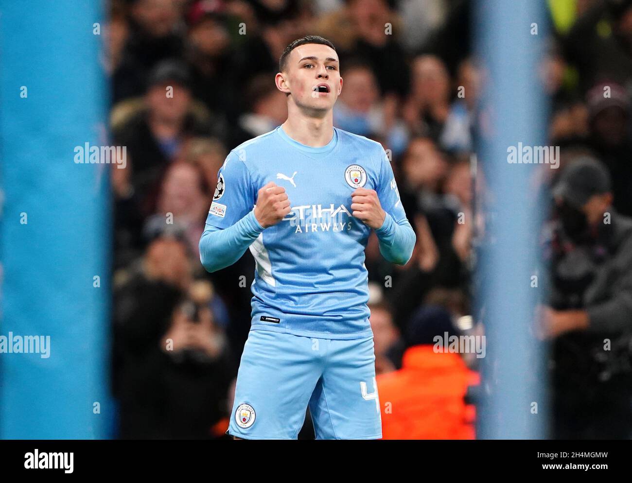 Manchester City's Phil Foden celebrates scoring their side's first goal ...