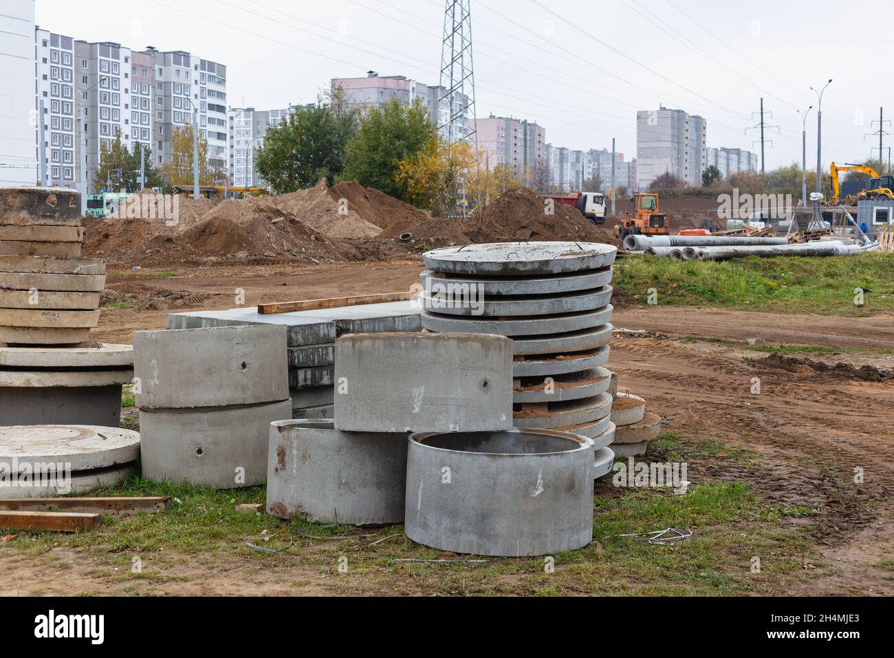 Concrete well rings and slabs at construction site Stock Photo - Alamy