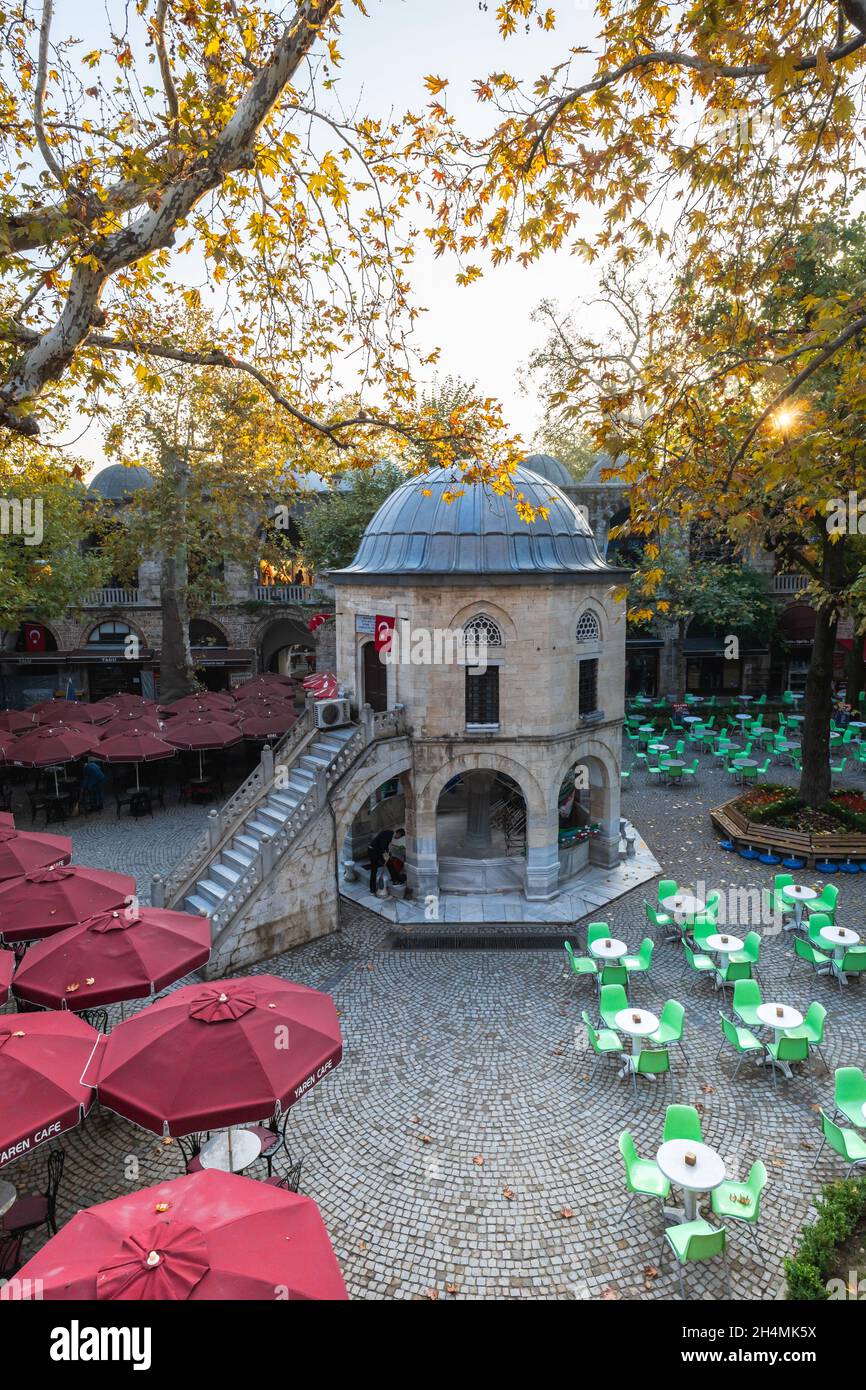 Koza Han tea gardens and mosque in Koza Han Silk Bazaar. Koza Han is ...