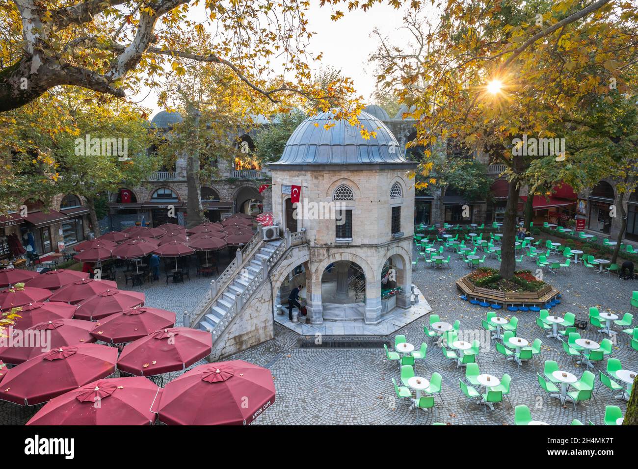 Koza Han tea gardens and mosque in Koza Han Silk Bazaar. Koza Han is ...