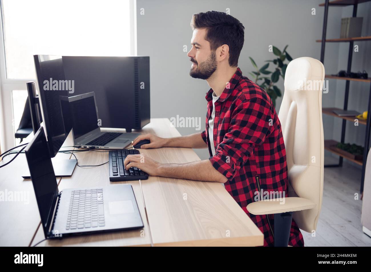 Profile side photo of happy charming young man work desk write editor ...