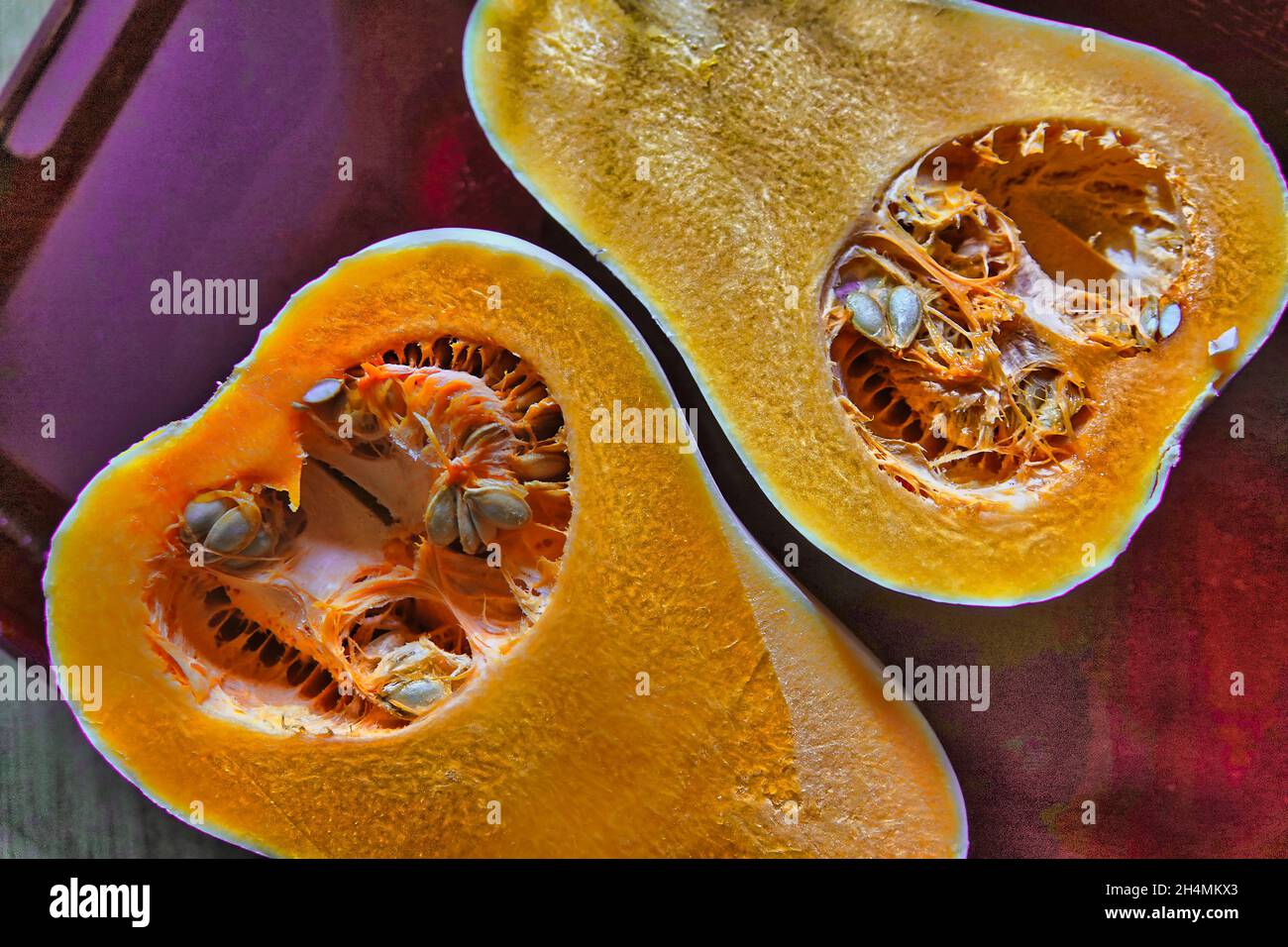 Butternut Squash - a split open display Stock Photo - Alamy