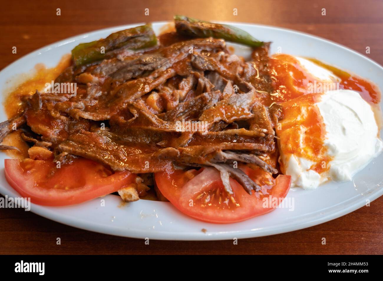 Iskender kebab, or Iskender Doner, a famous Turkish kebab dish ...