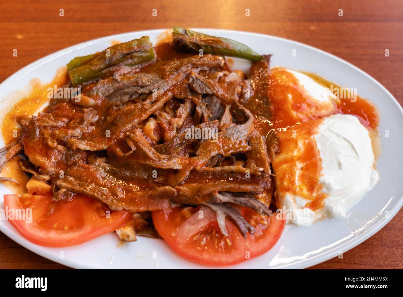 Iskender kebab, or Iskender Doner, a famous Turkish kebab dish ...