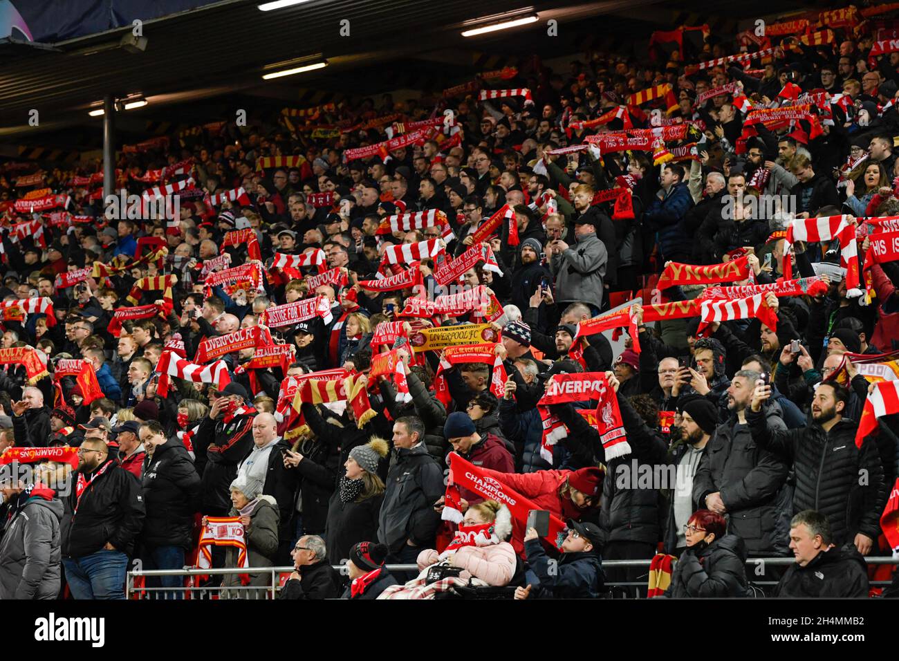 The Liverpool fans sing You’ll Never Walk Alone before the game Stock ...