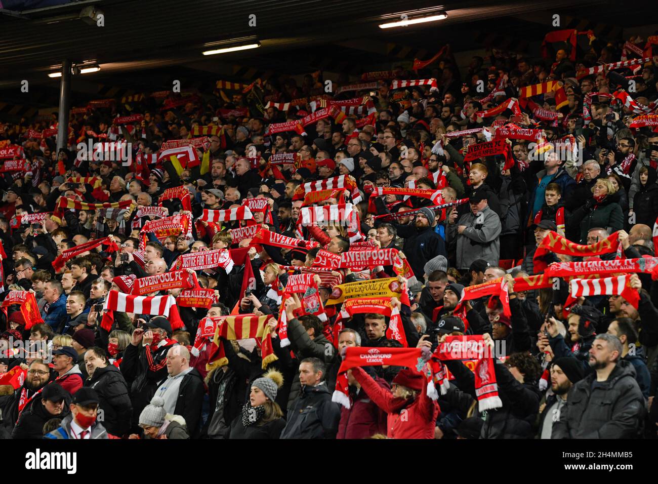The Liverpool fans sing You’ll Never Walk Alone before the game Stock ...