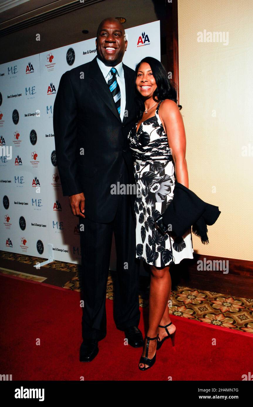 (L-R) Former NBA Player Earvin "Magic" Johnson and Earlitha "Cookie ...