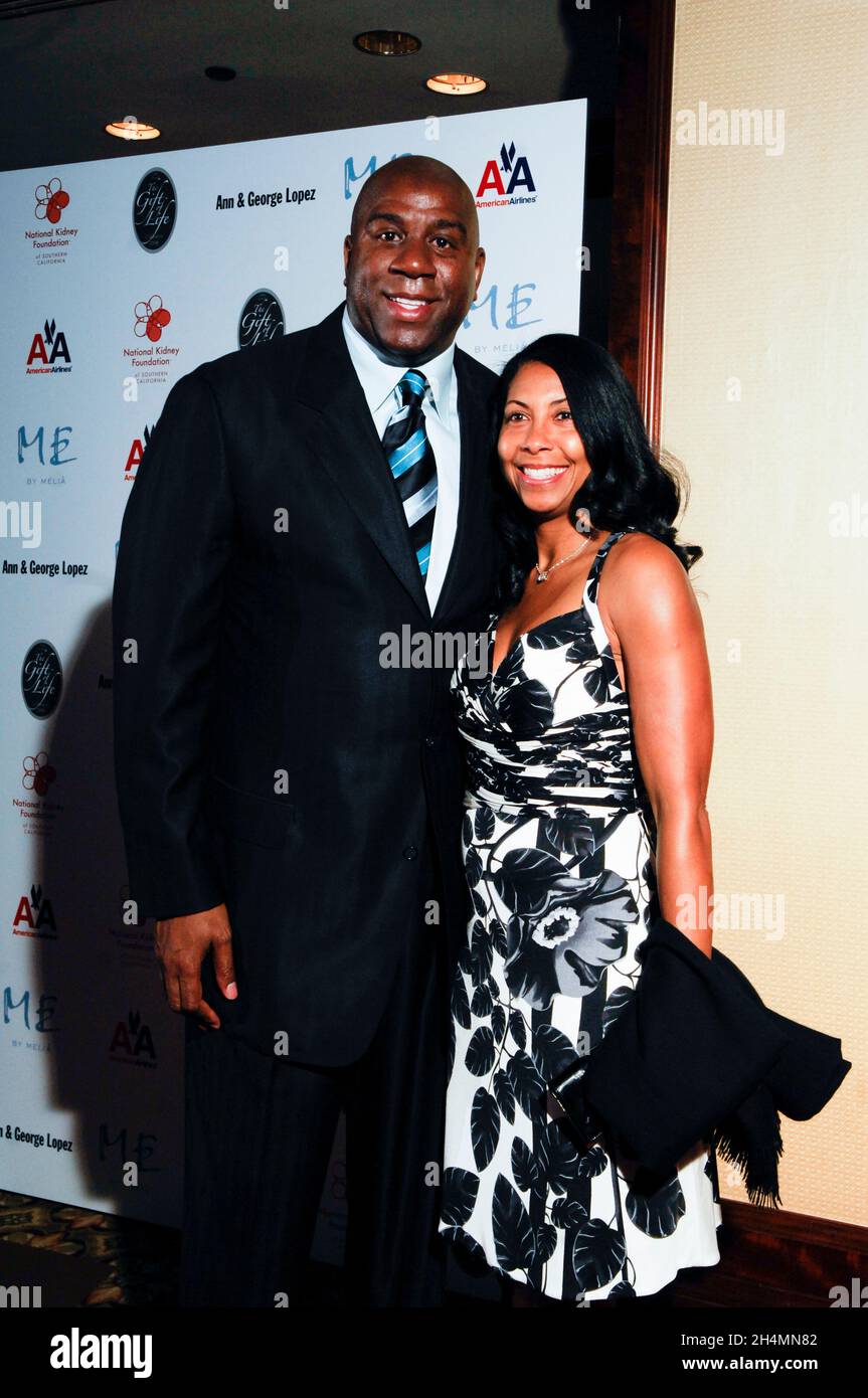 (L-R) Former NBA Player Earvin "Magic" Johnson and Earlitha "Cookie ...