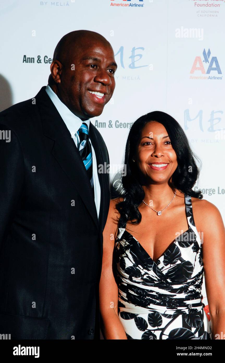 (L-R) Former NBA Player Earvin "Magic" Johnson and Earlitha "Cookie ...