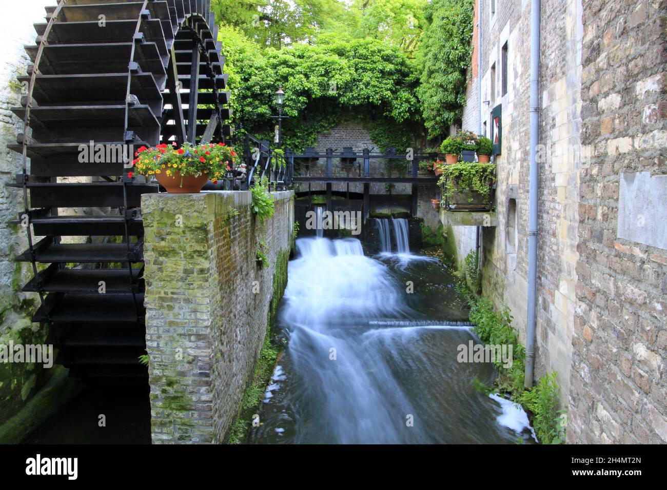 Beautiful view of an old mill in the river Stock Photo - Alamy