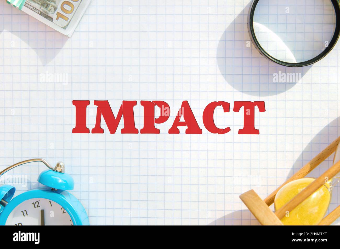 Notebook with the word Impact. The concept of influencing something ...