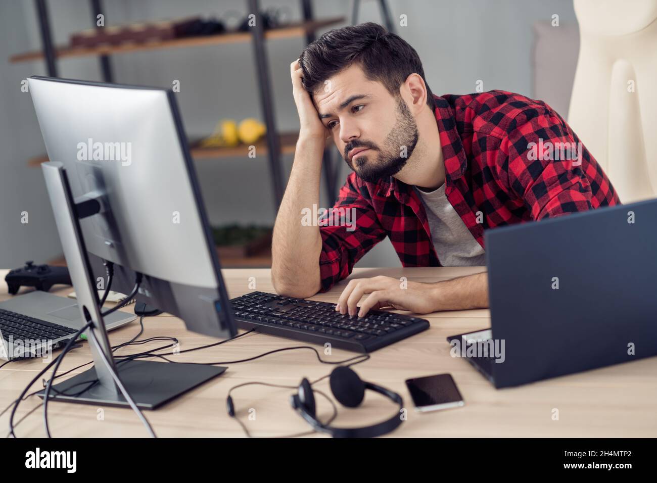 Portrait of attractive experienced bored exhausted guy writing security ...
