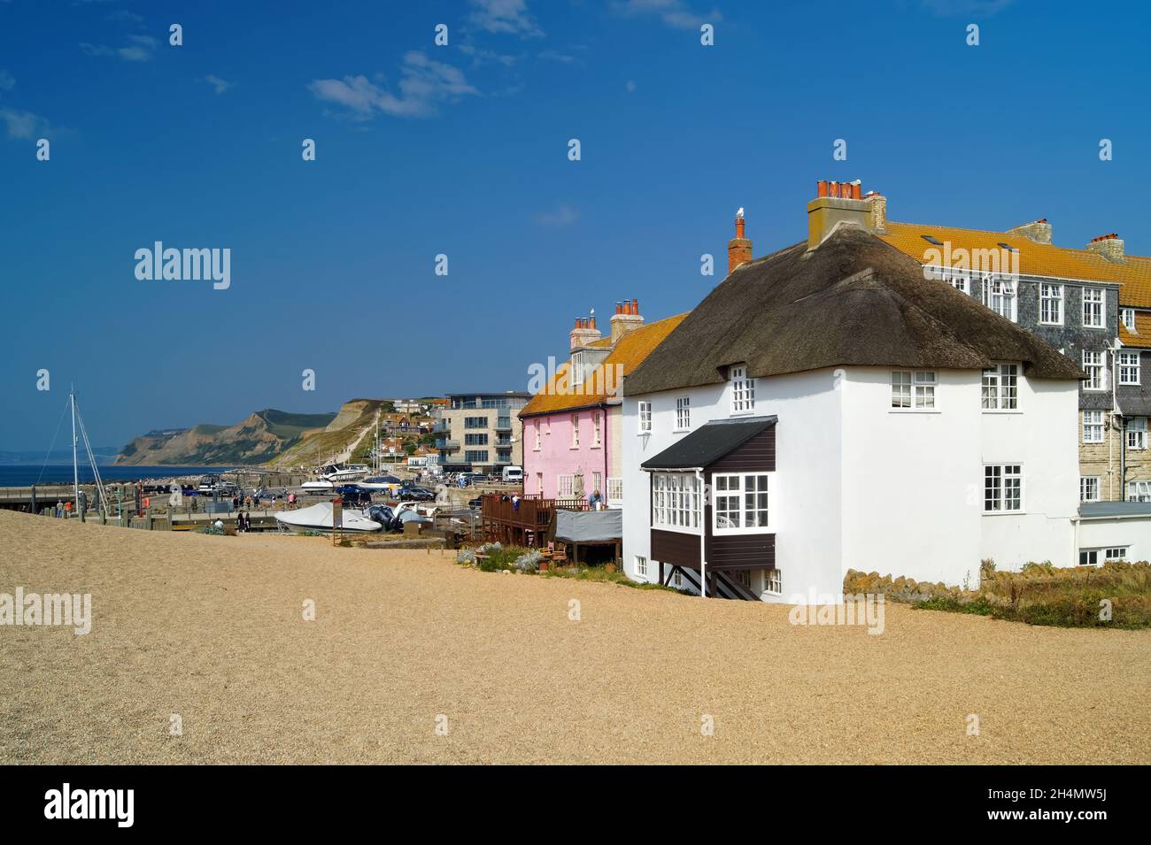 UK, Dorset, Jurassic Coast, West Bay, Colourful Beachfront Cottages ...