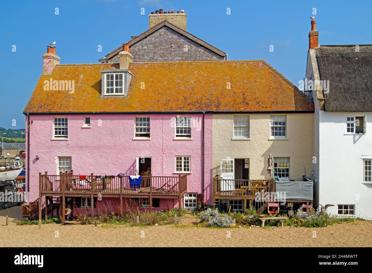 UK, Dorset, Jurassic Coast, West Bay, Colourful Beachfront Cottages ...