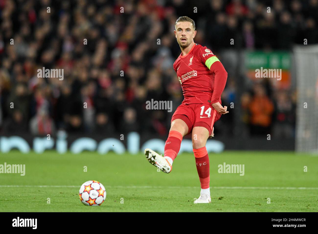 Jordan Henderson #14 of Liverpool passes the ball Stock Photo - Alamy