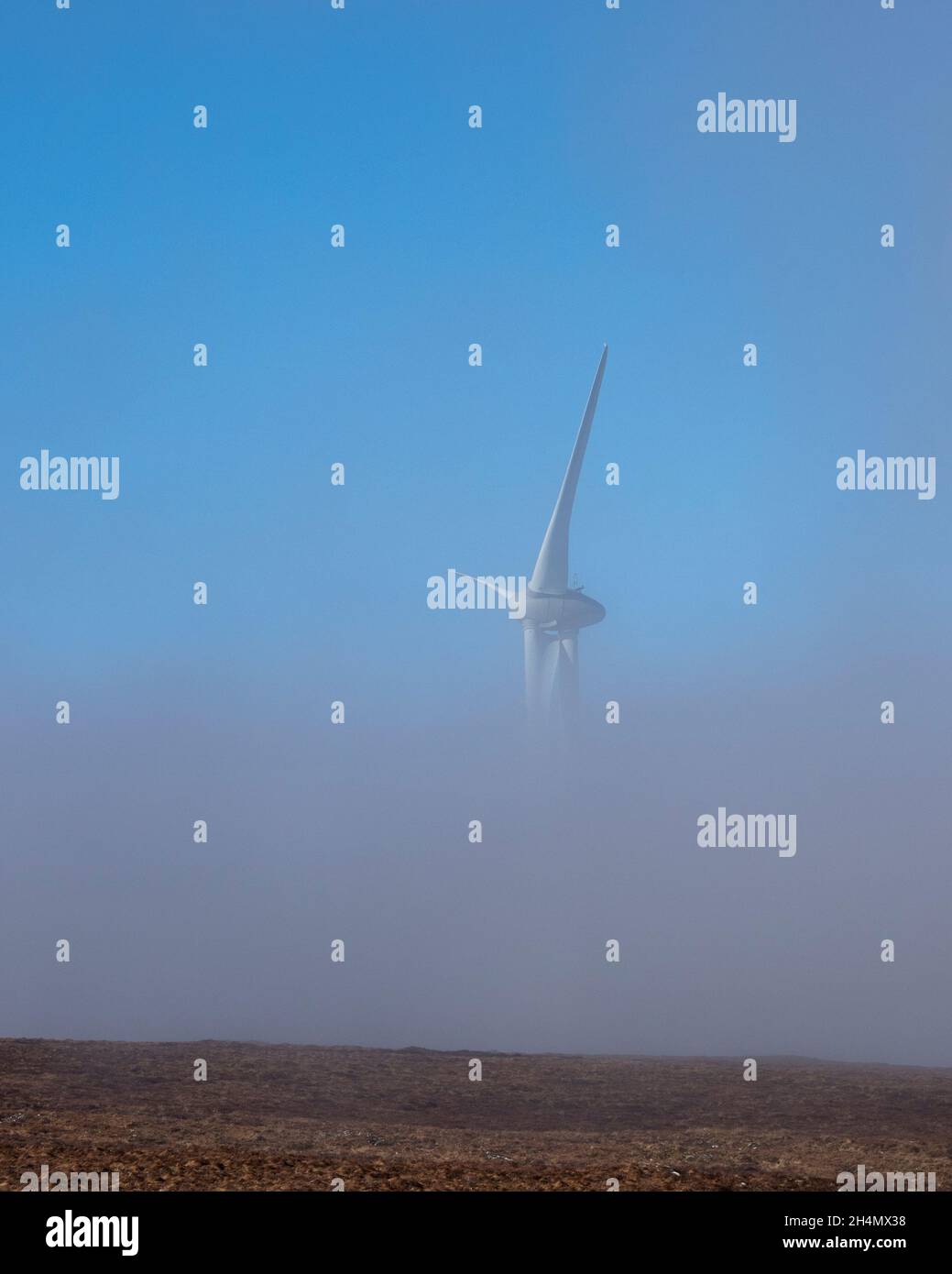 Wind turbine emerging from the mist. Corrimony Wind Farm, Highland ...