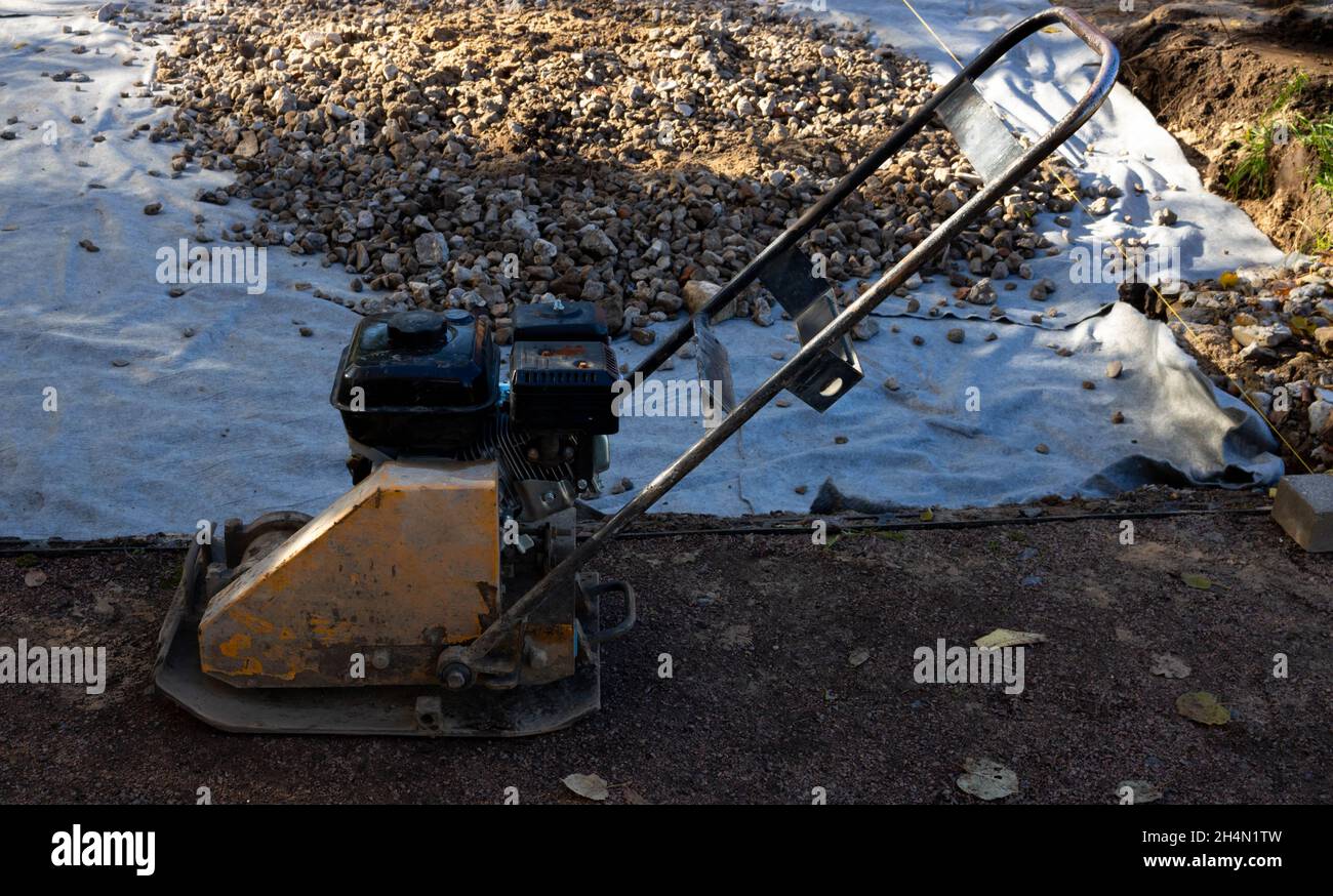 Vibrating plate hi-res stock photography and images - Alamy