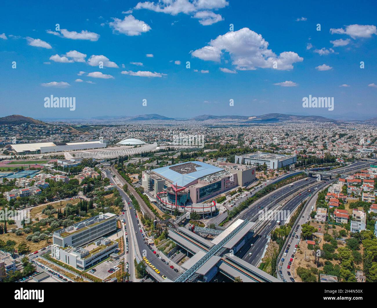 Aerial panoramic view of northern suburbs of Athens city. Centered the ...