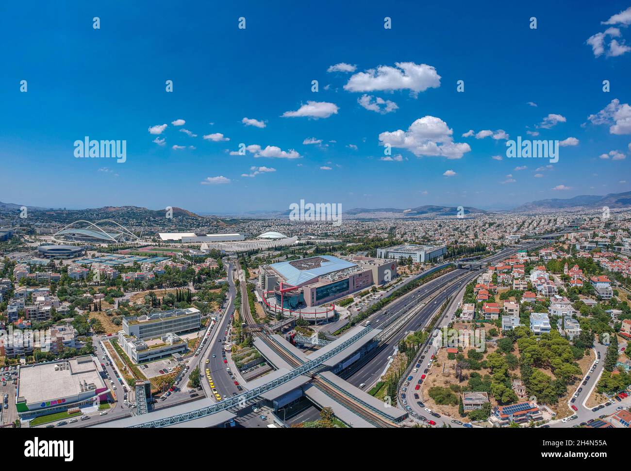 Aerial panoramic view of northern suburbs of Athens city. Centered the ...