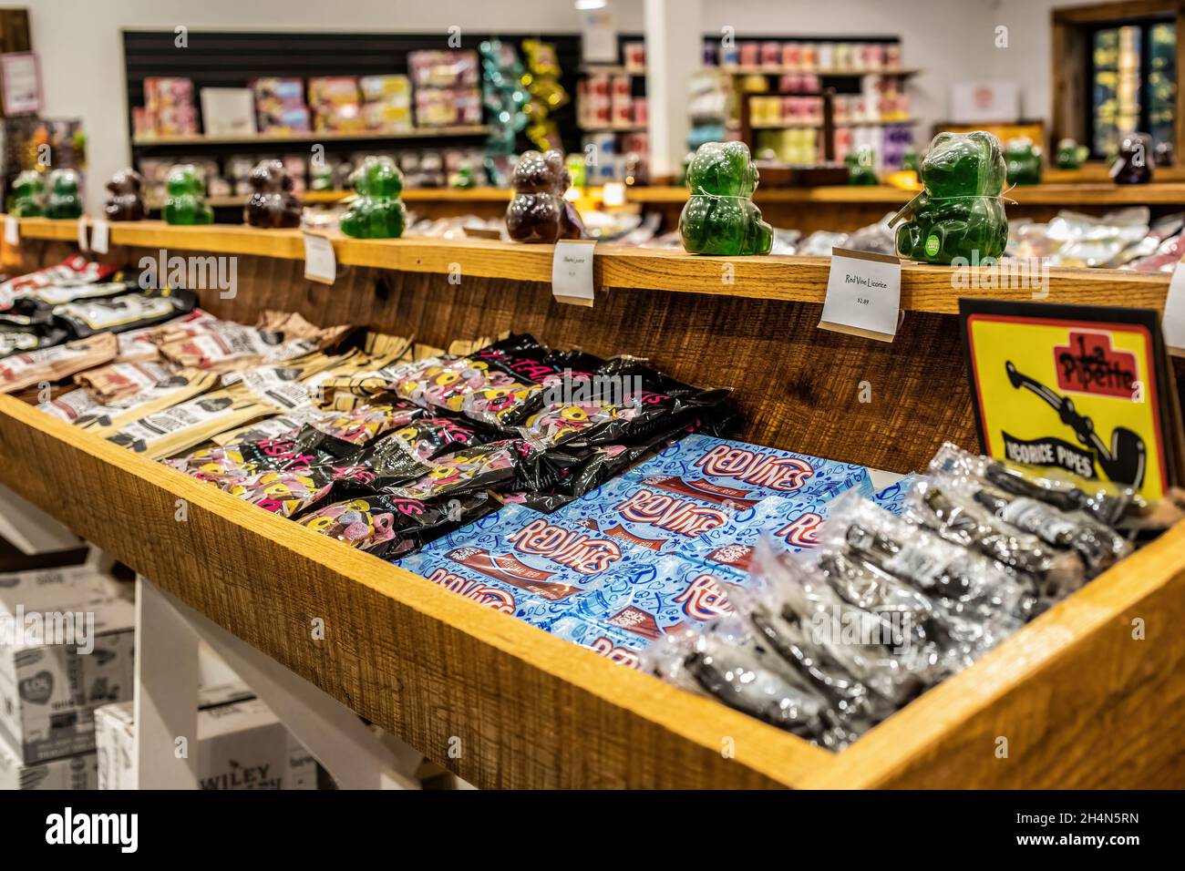 Inside of Sweetly Kismet Candy Store with lots of shelves of candy ...