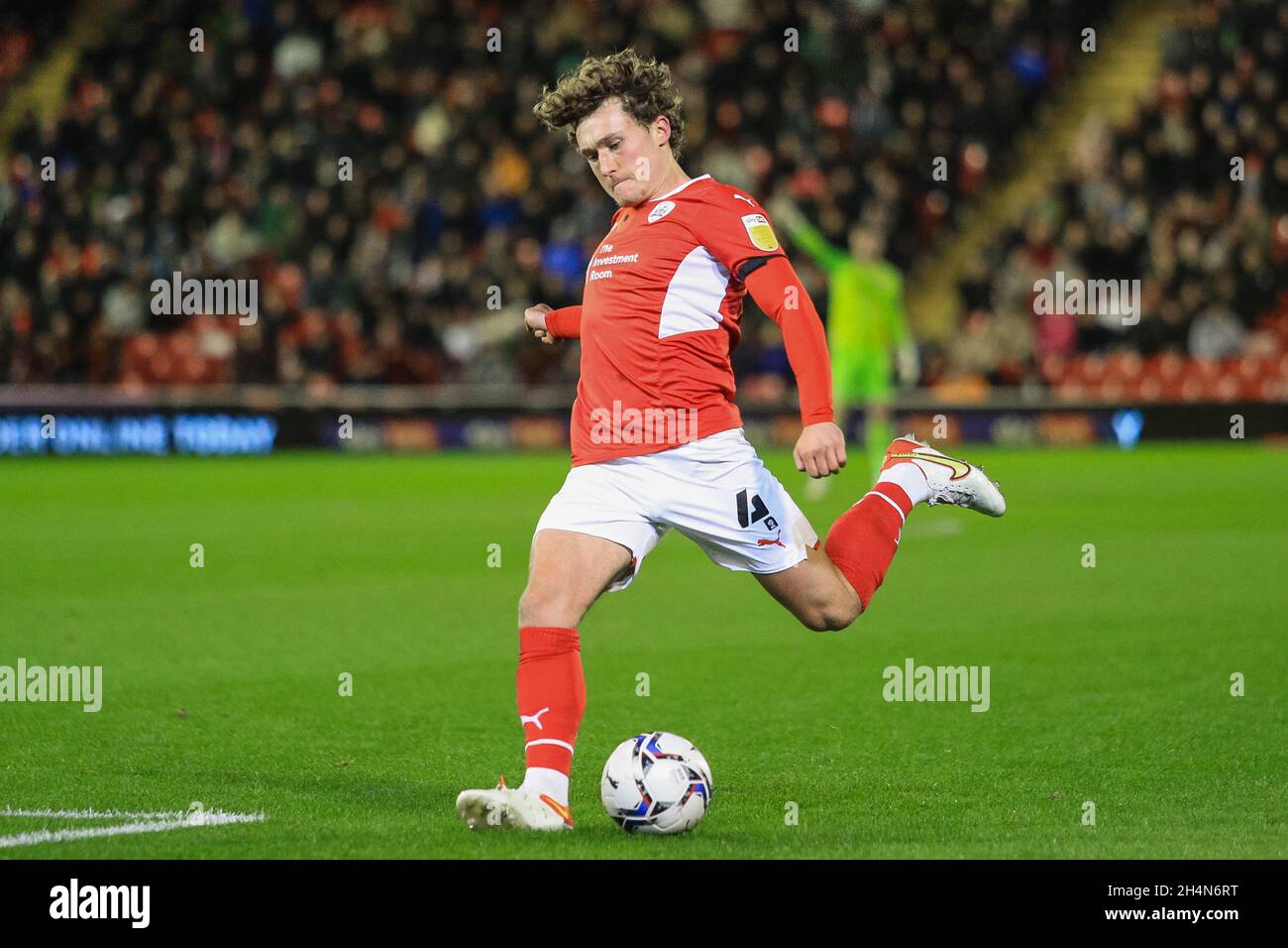 Callum Styles #4 of Barnsley crosses the ball into the box Stock Photo ...