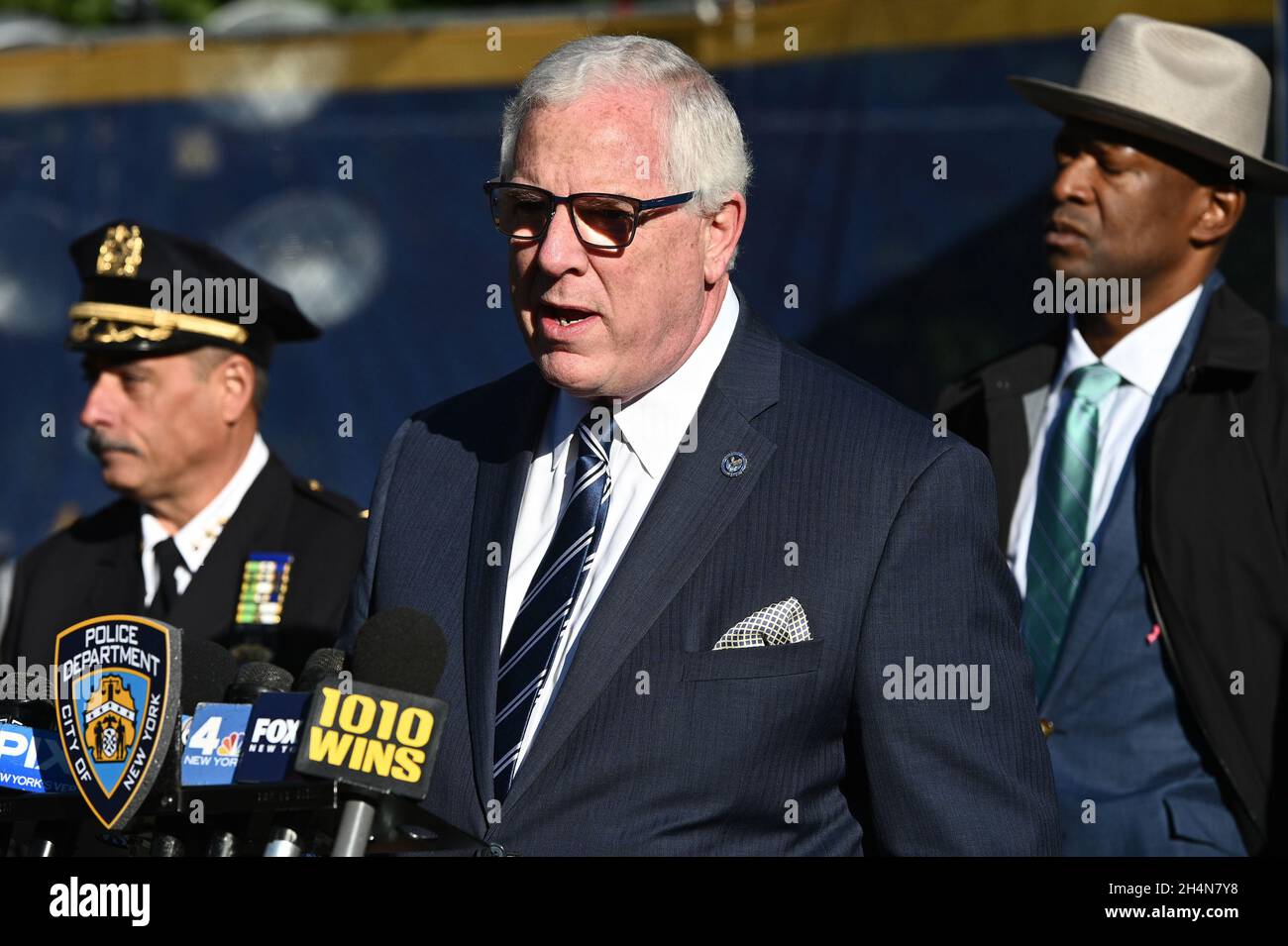 New York, USA. 03rd Nov, 2021. John Miller (c), Deputy Commissioner of ...