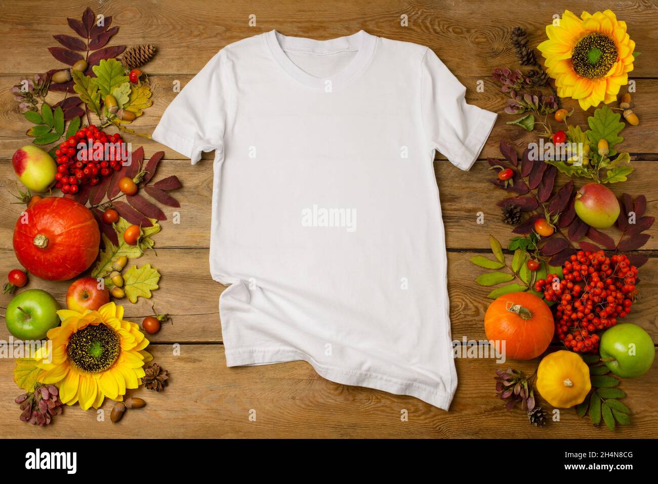 White unisex cotton T-shirt mockup with sunflowers, pumpkins and fall ...