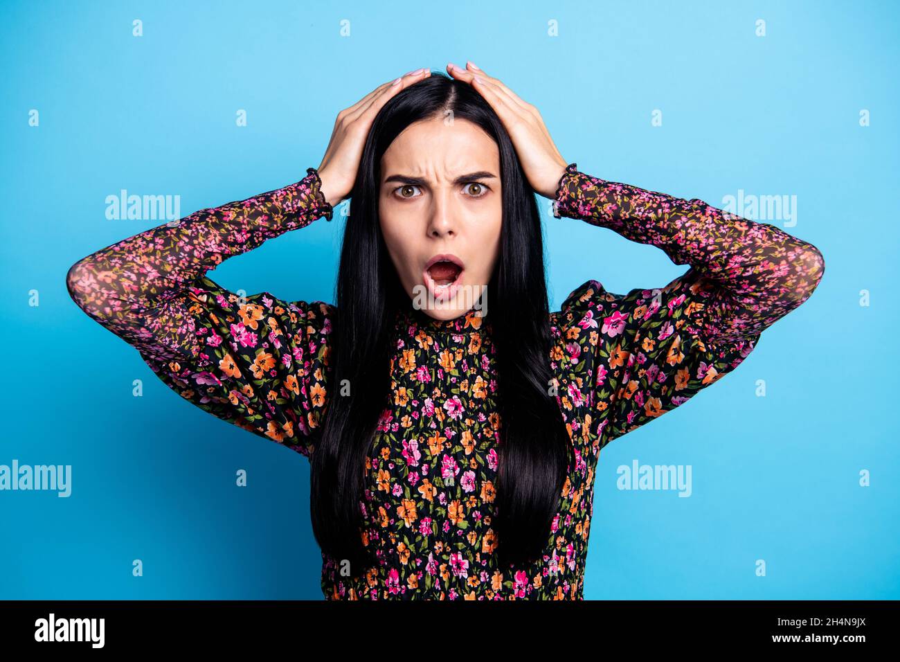 Photo of crazy loser lady open mouth hands head wear floral print shirt ...